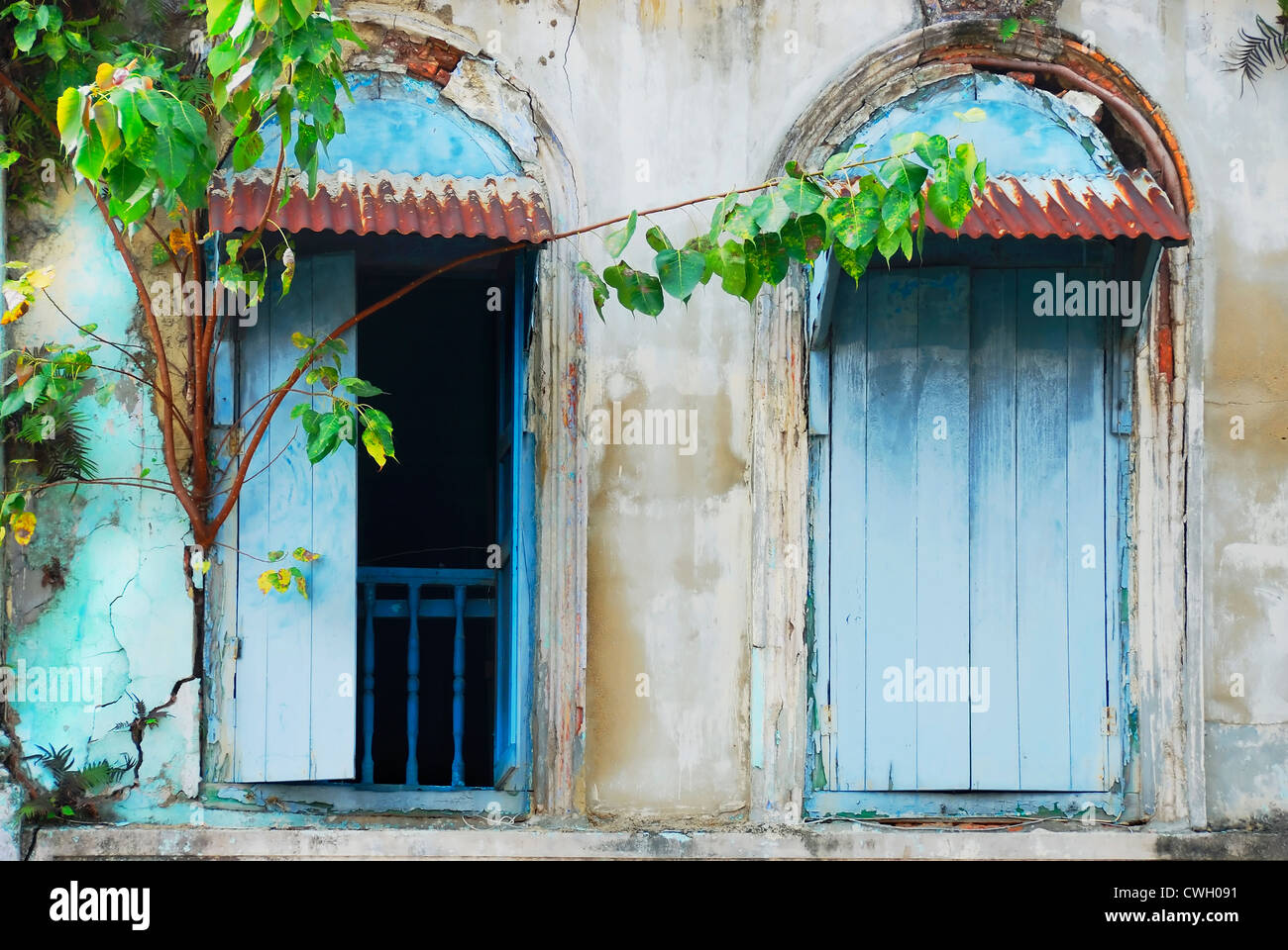 old windows in an urban area Stock Photo - Alamy