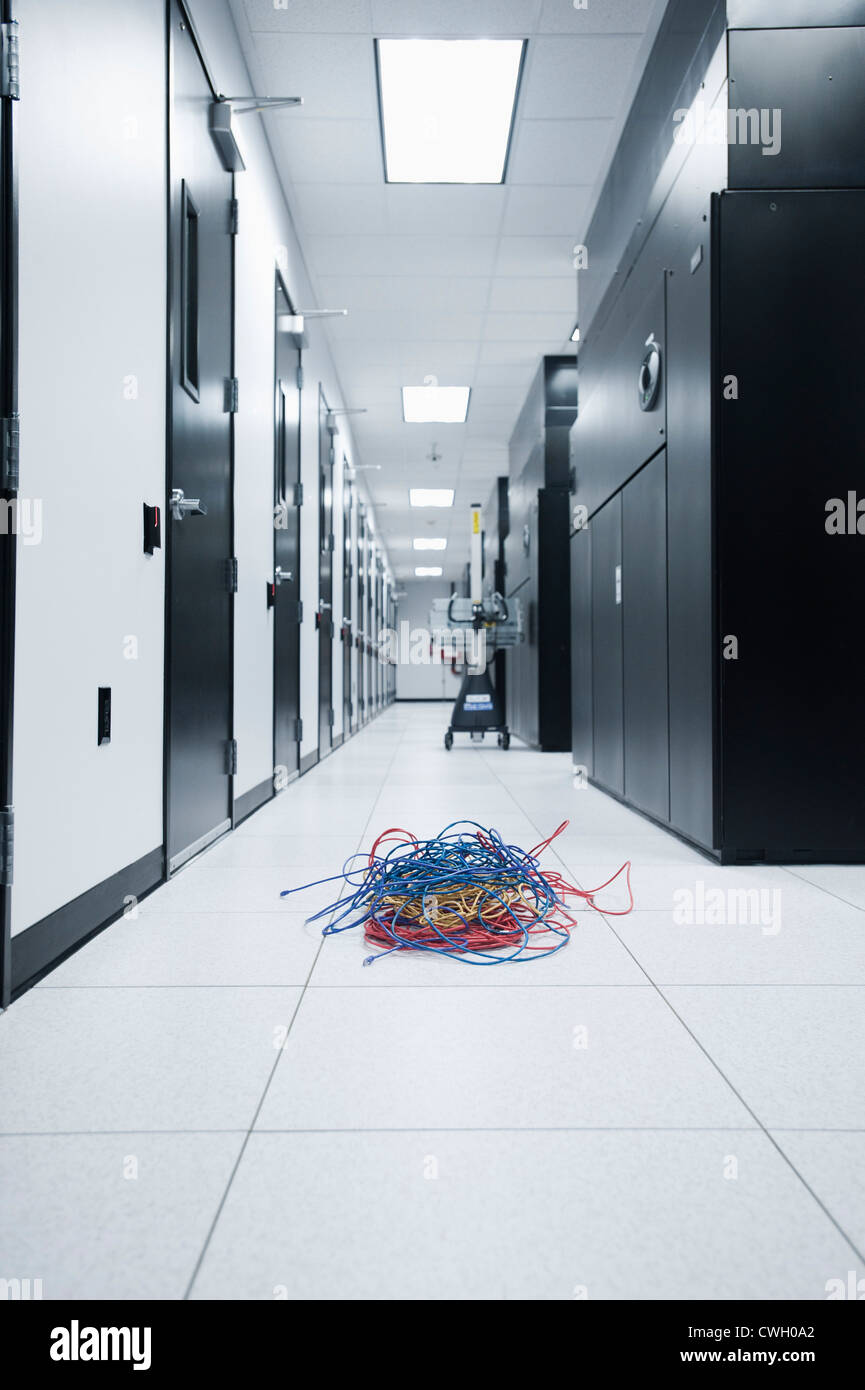 Cables on floor of server room Stock Photo - Alamy