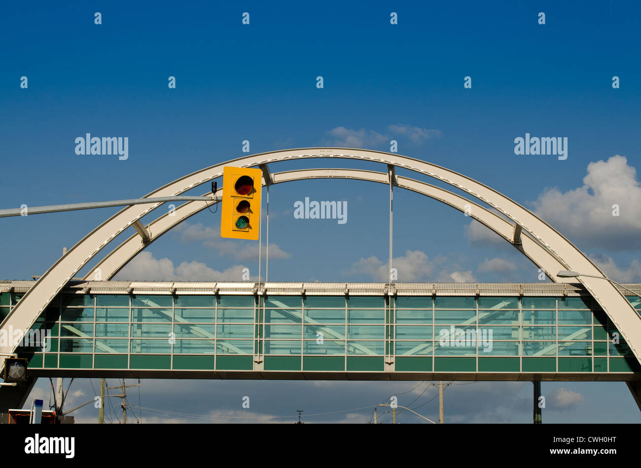 Arched pedestrian bridge Stock Photo - Alamy