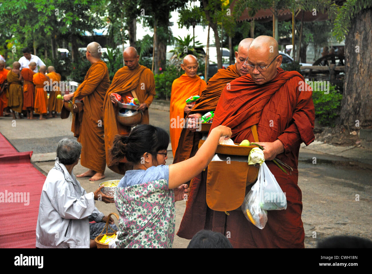 Monks receiving food and essentials on Buddha day(Buddhist lent) on 2 ...