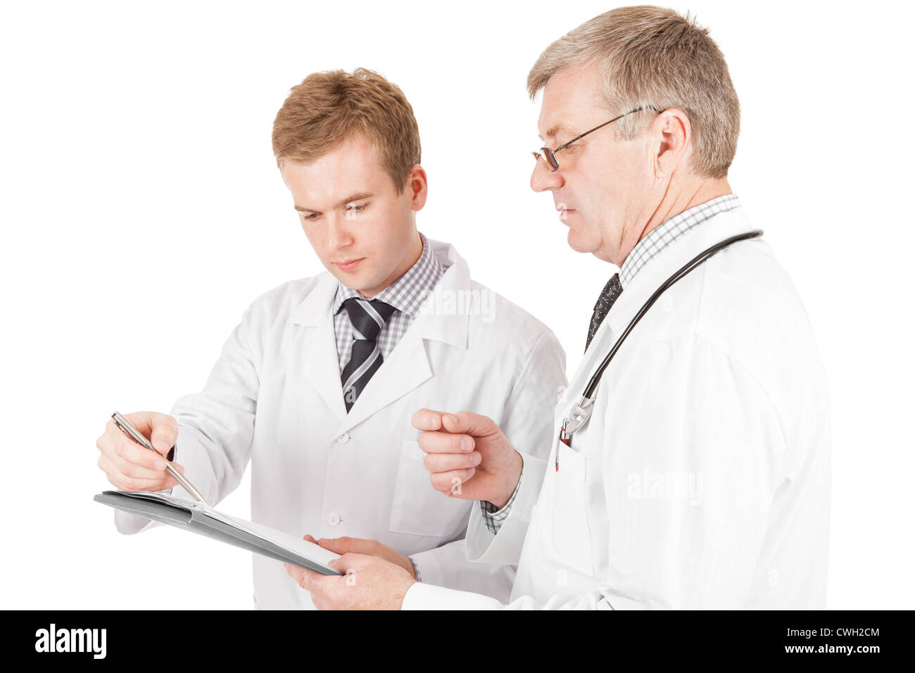 Two medical doctors talking about something Stock Photo - Alamy