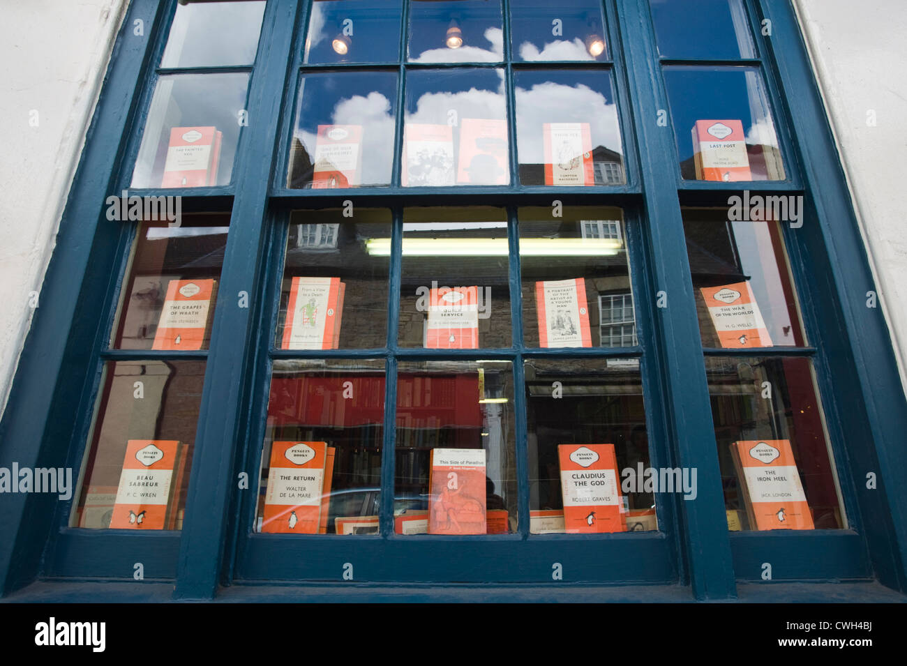 Penguin books display in window of bookshop in Hay on Wye, Powys, Wales ...