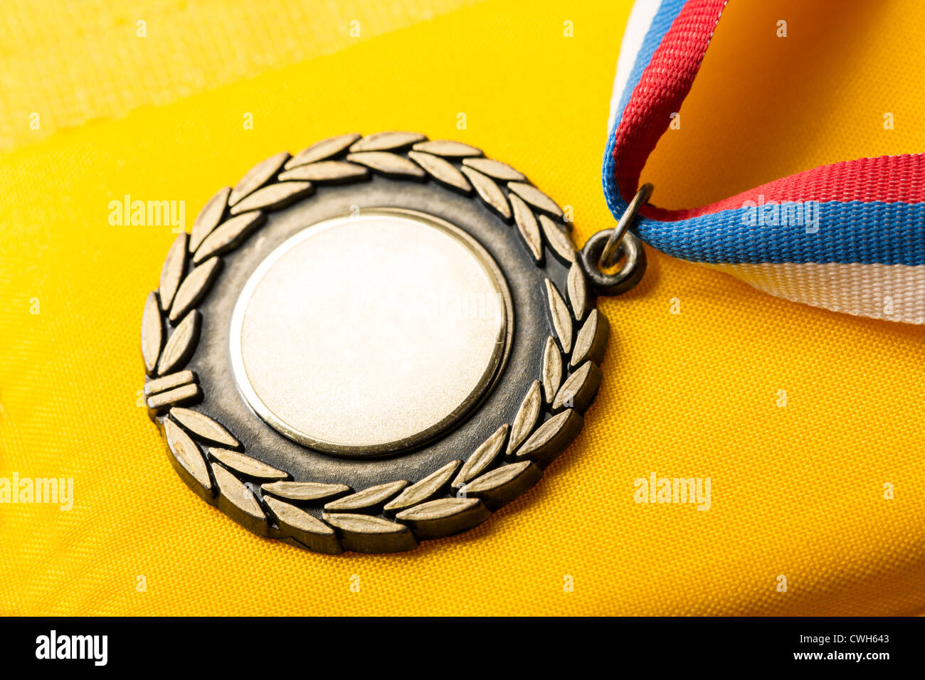 Metal medal with tricolor ribbon Stock Photo - Alamy