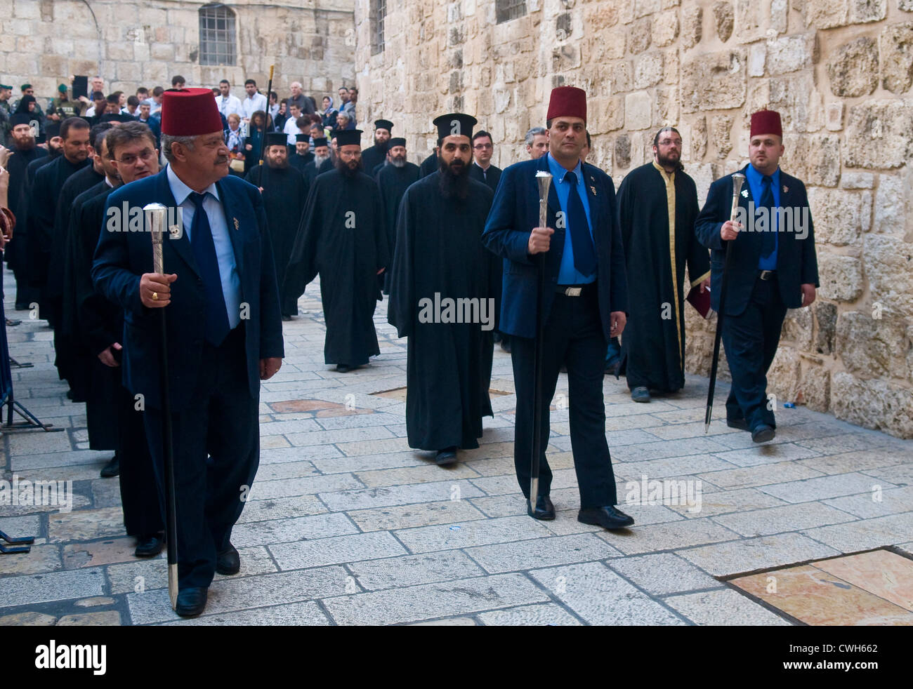 Greek Orthodox monks takes part in the Good Friday procession in ...