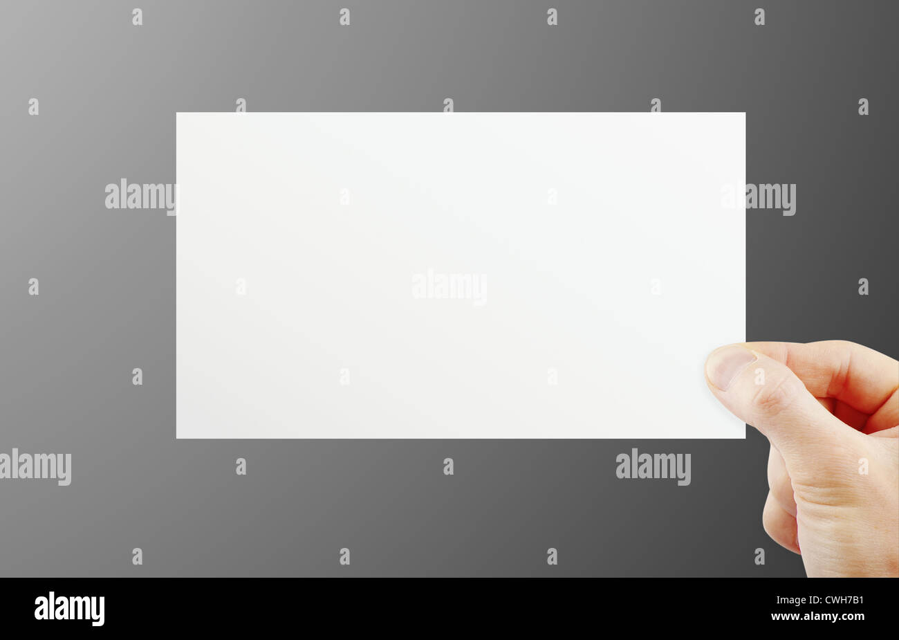 Hand holding paper Stock Photo - Alamy