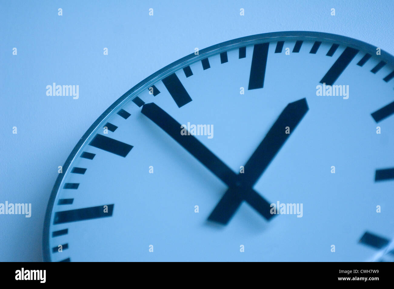 Wall clock in an office building, Berlin Stock Photo - Alamy