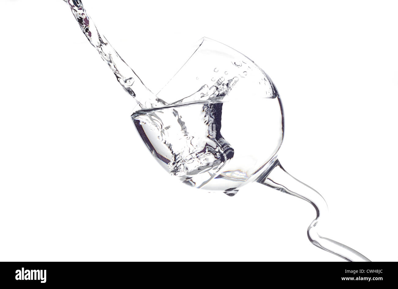 Pouring fresh water on a white background Stock Photo - Alamy