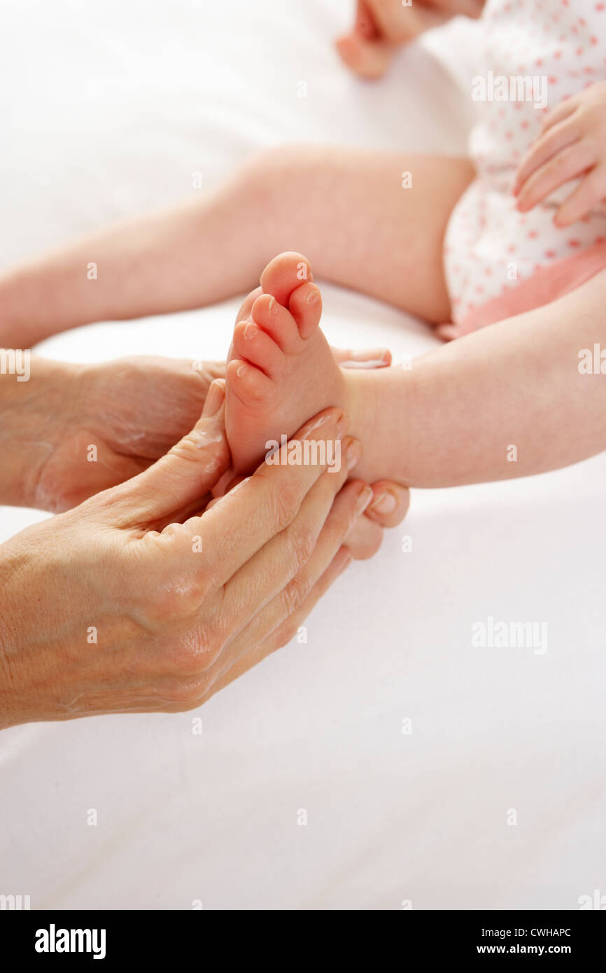 Baby foot reflexology points hi-res stock photography and images - Alamy