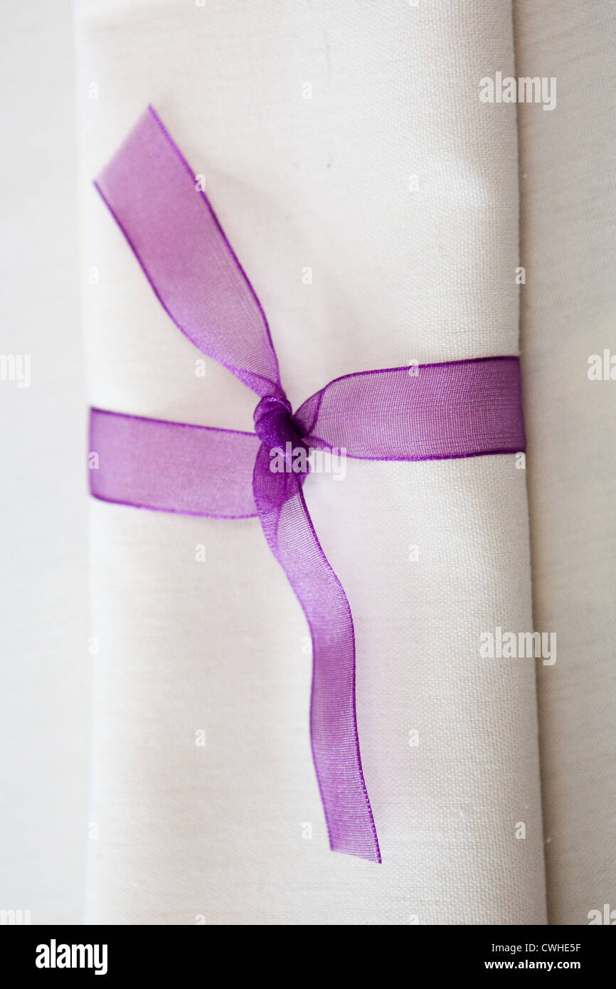 Purple napkin ribbon Stock Photo - Alamy