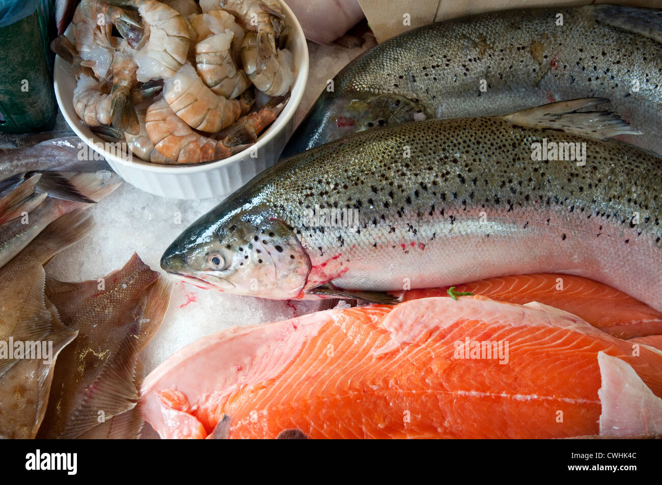 fishmonger wet fish display counter Stock Photo - Alamy
