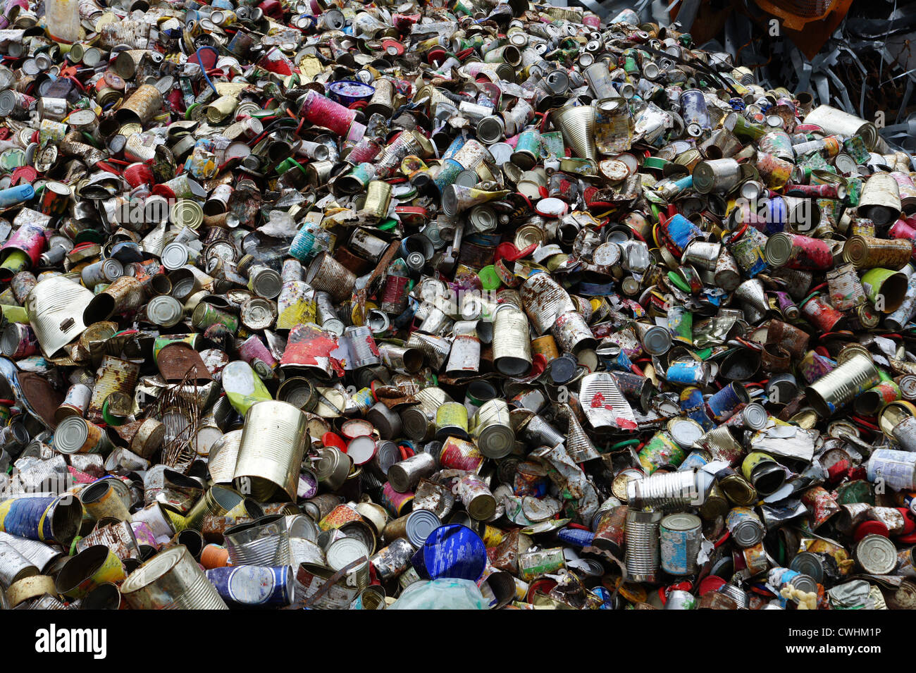 Greater heap of the old used cans Stock Photo - Alamy