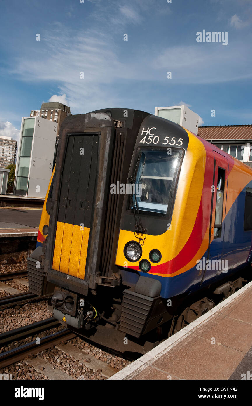 A class 450 passenger train in South West Trains livery at Clapham ...