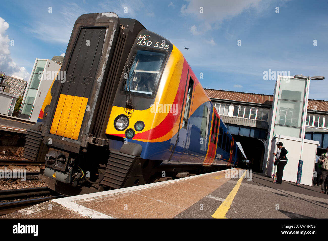 A class 450 passenger train in South West Trains livery at Clapham ...