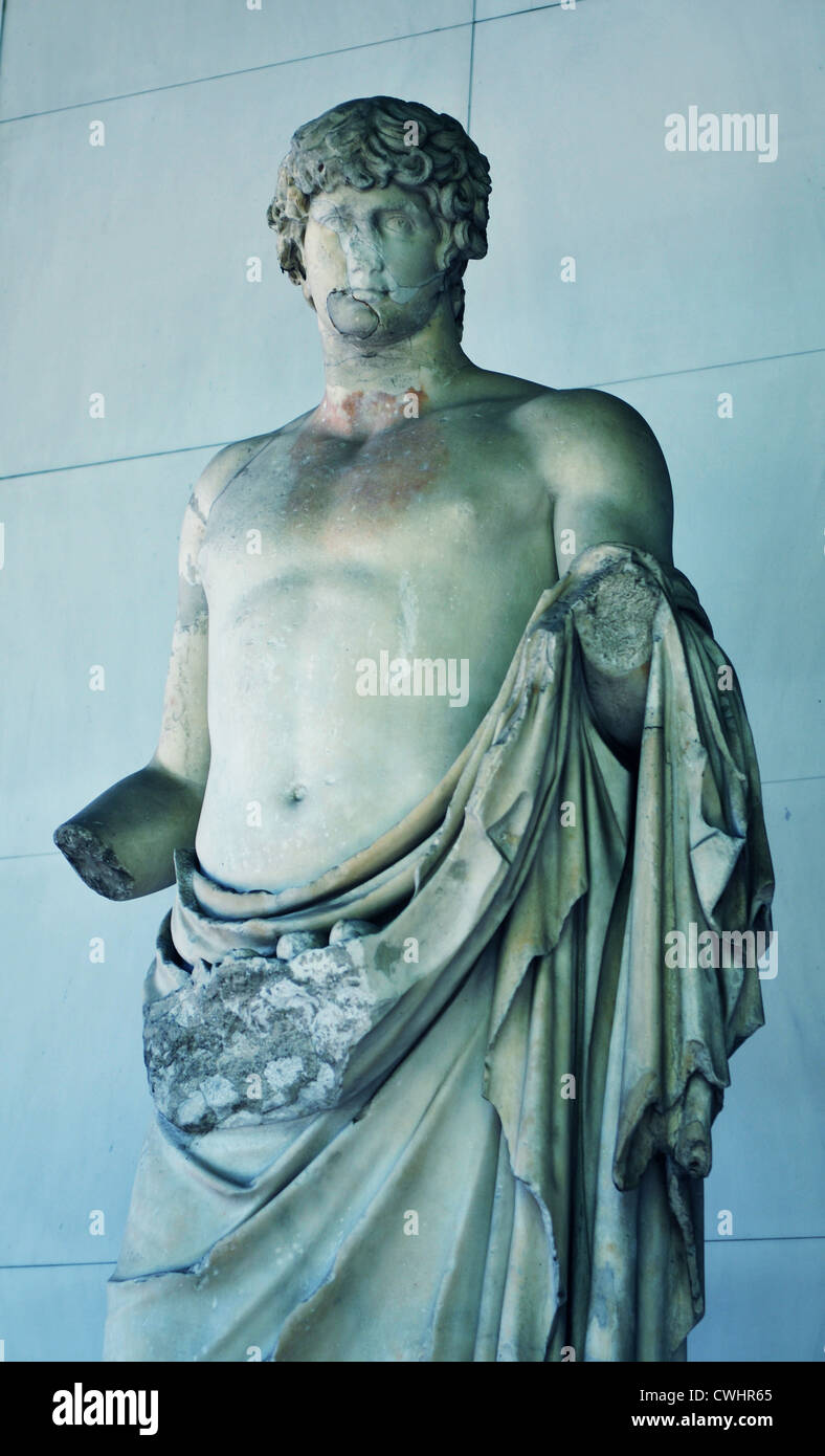 Architectural detail of old Roman statue against marble background ...