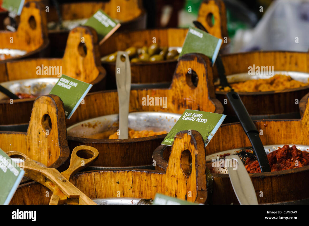 Mediterranean traditional food on sale at a market stall, including ...