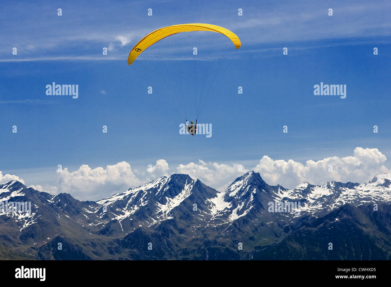 Para Gliding above the Austrian Alps Stock Photo - Alamy