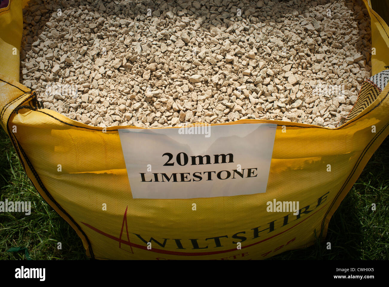 Sack of limestone chippings used in construction and landscaping work ...