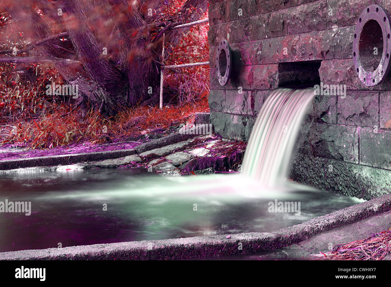 Colour Inverted water outlet Stock Photo - Alamy