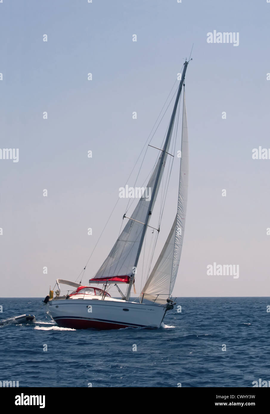 Turning sailing boat in the sea Stock Photo - Alamy