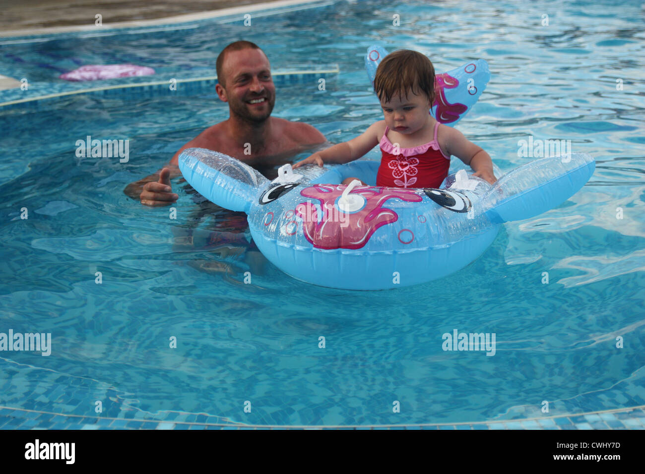 Dad and daughter in the swimming pool Stock Photo - Alamy