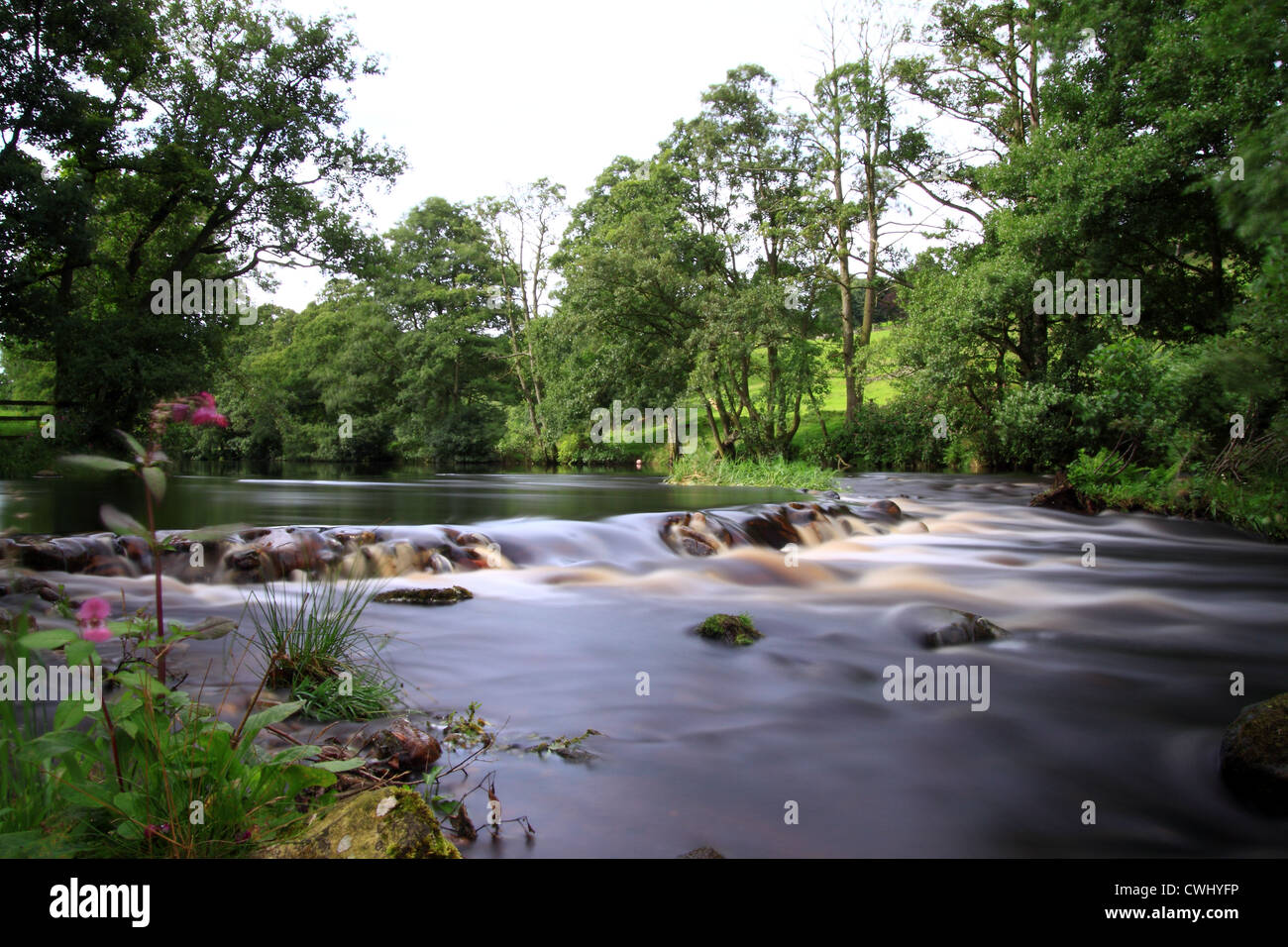 River in Flow Stock Photo - Alamy