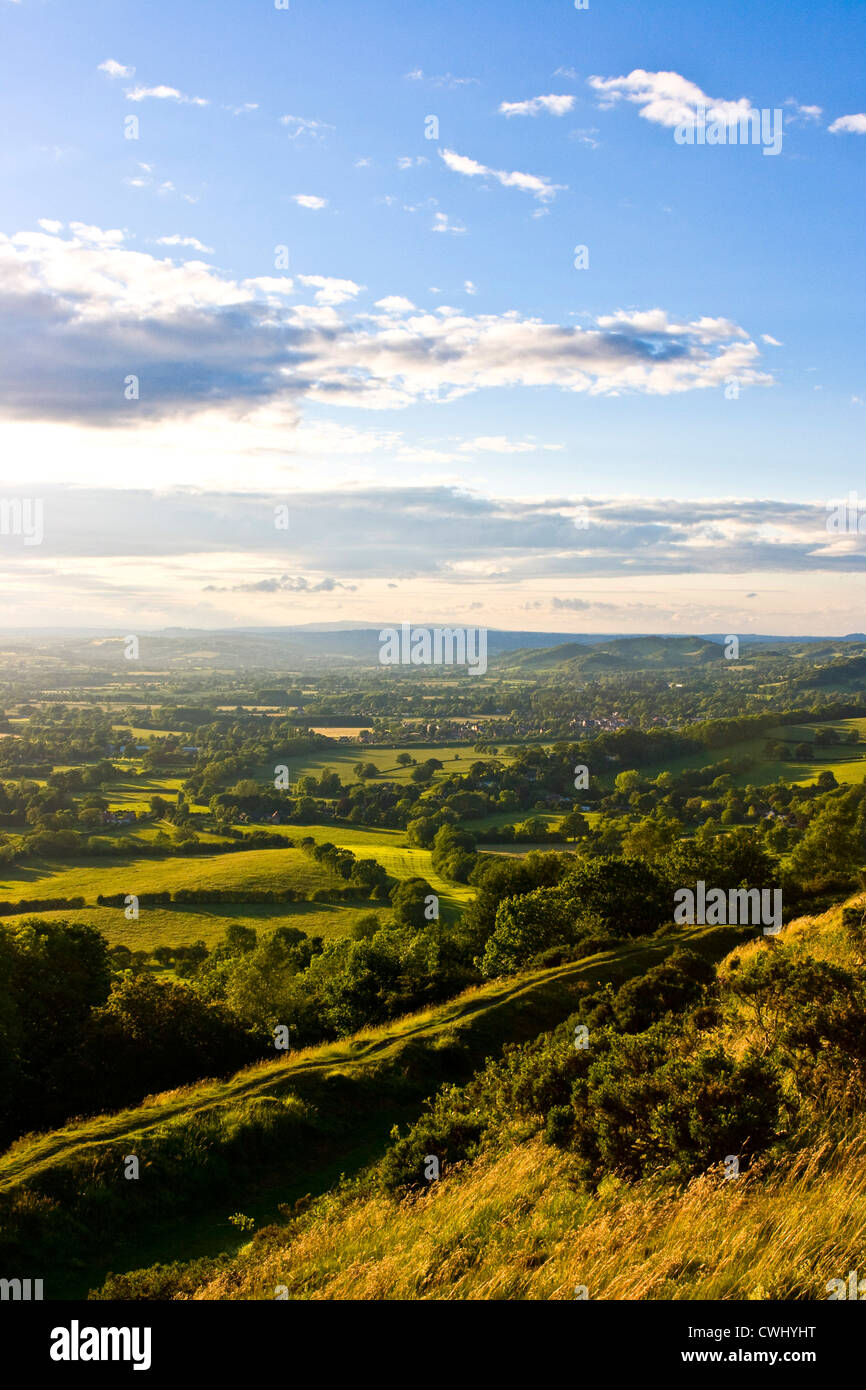 English countryside bathed in vibrant dusk light from Malvern Hills ...