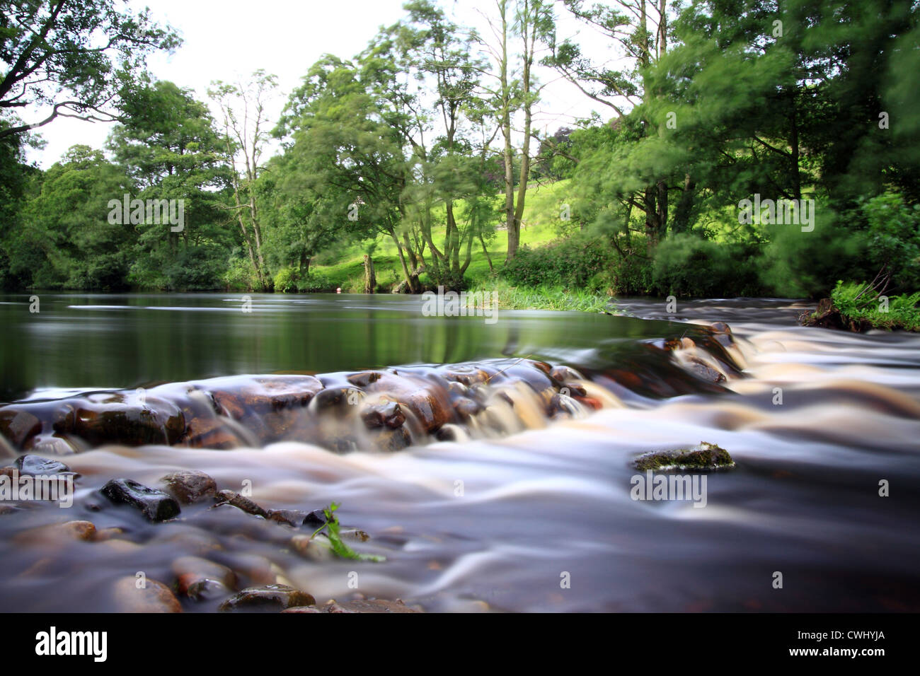River in Flow Stock Photo - Alamy