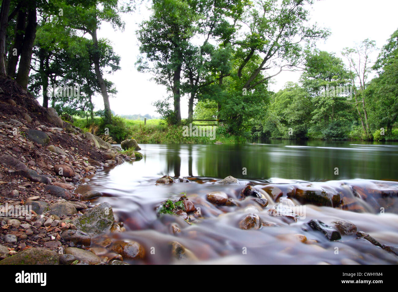 River in Flow Stock Photo - Alamy