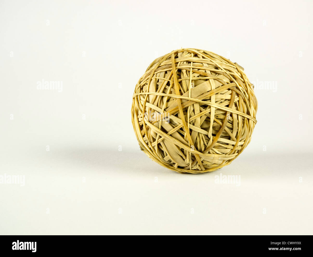 Rubber Elastic band ball on white background Stock Photo - Alamy
