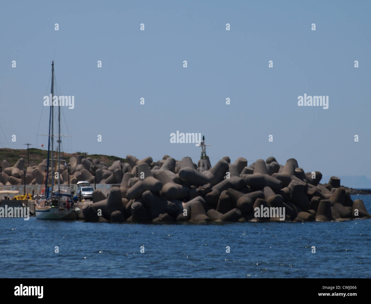 A yacht in a cove Stock Photo - Alamy