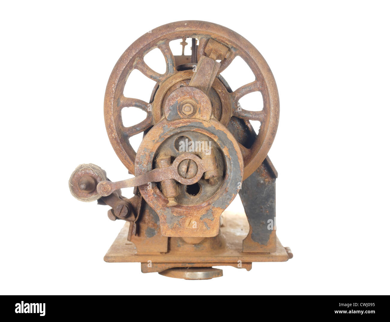 Rusty skeleton of an ancient sewing machine, isolated on white ...