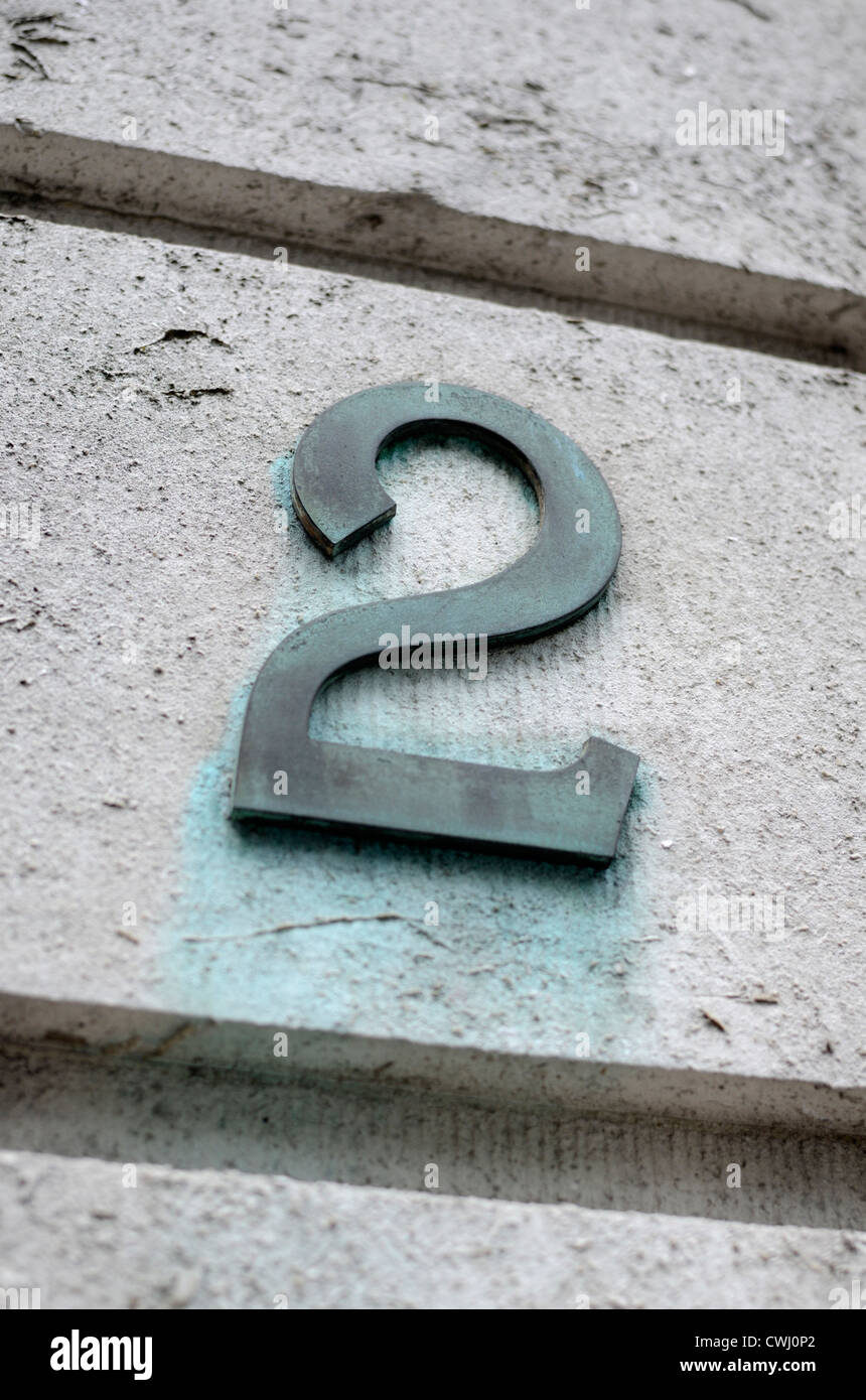 Street number two on a wall Stock Photo - Alamy