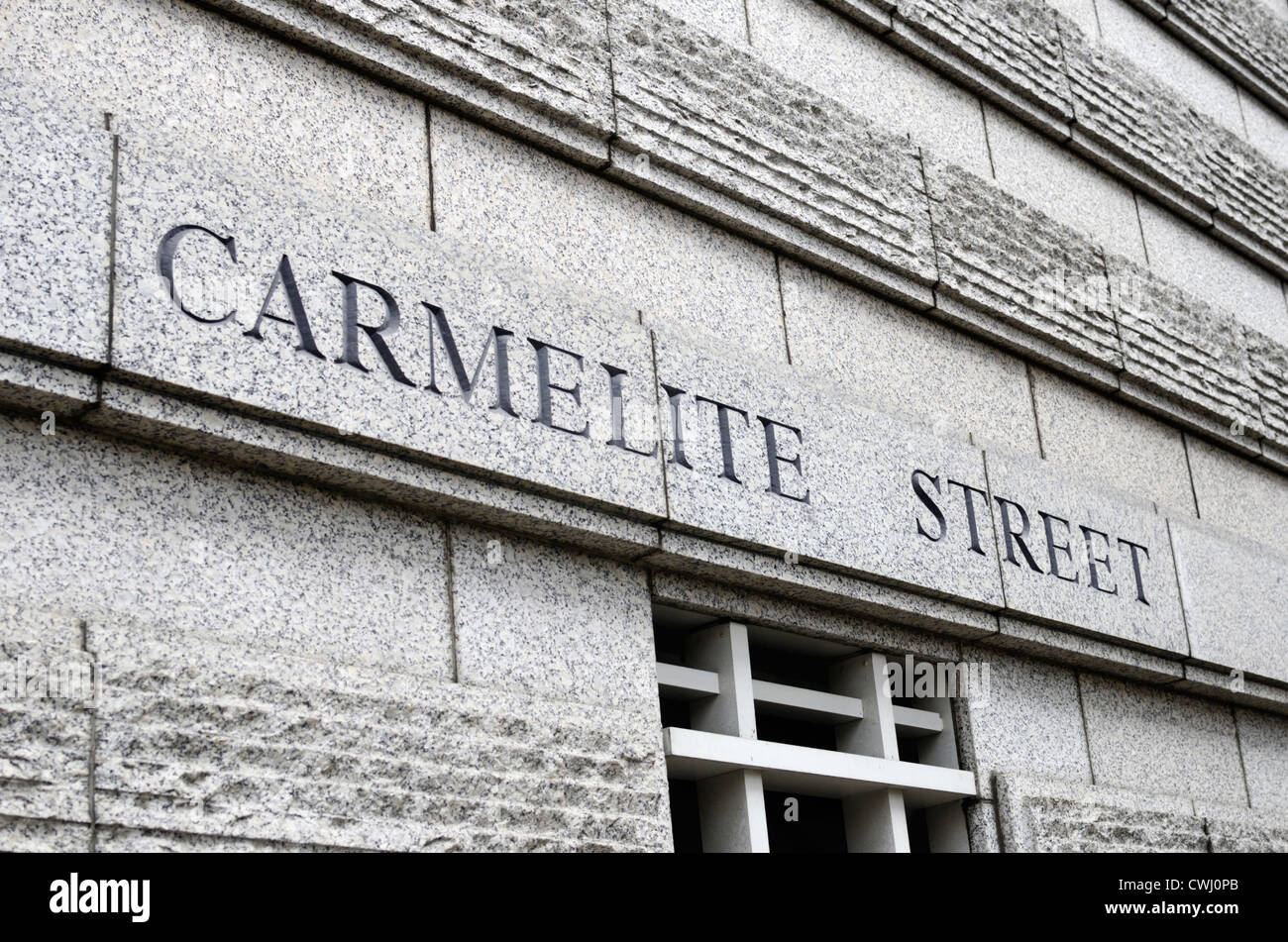 Carmelite Street sign carved into a building, London, England Stock ...