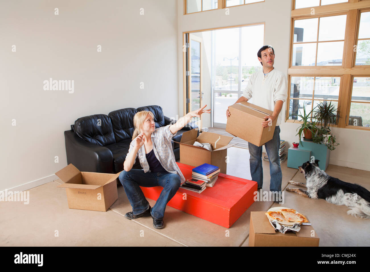 Couple moving into new house Stock Photo - Alamy