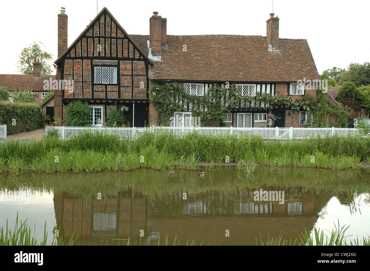 Pond in Aldbury, with the Old Manor House and Manor Cottage ...