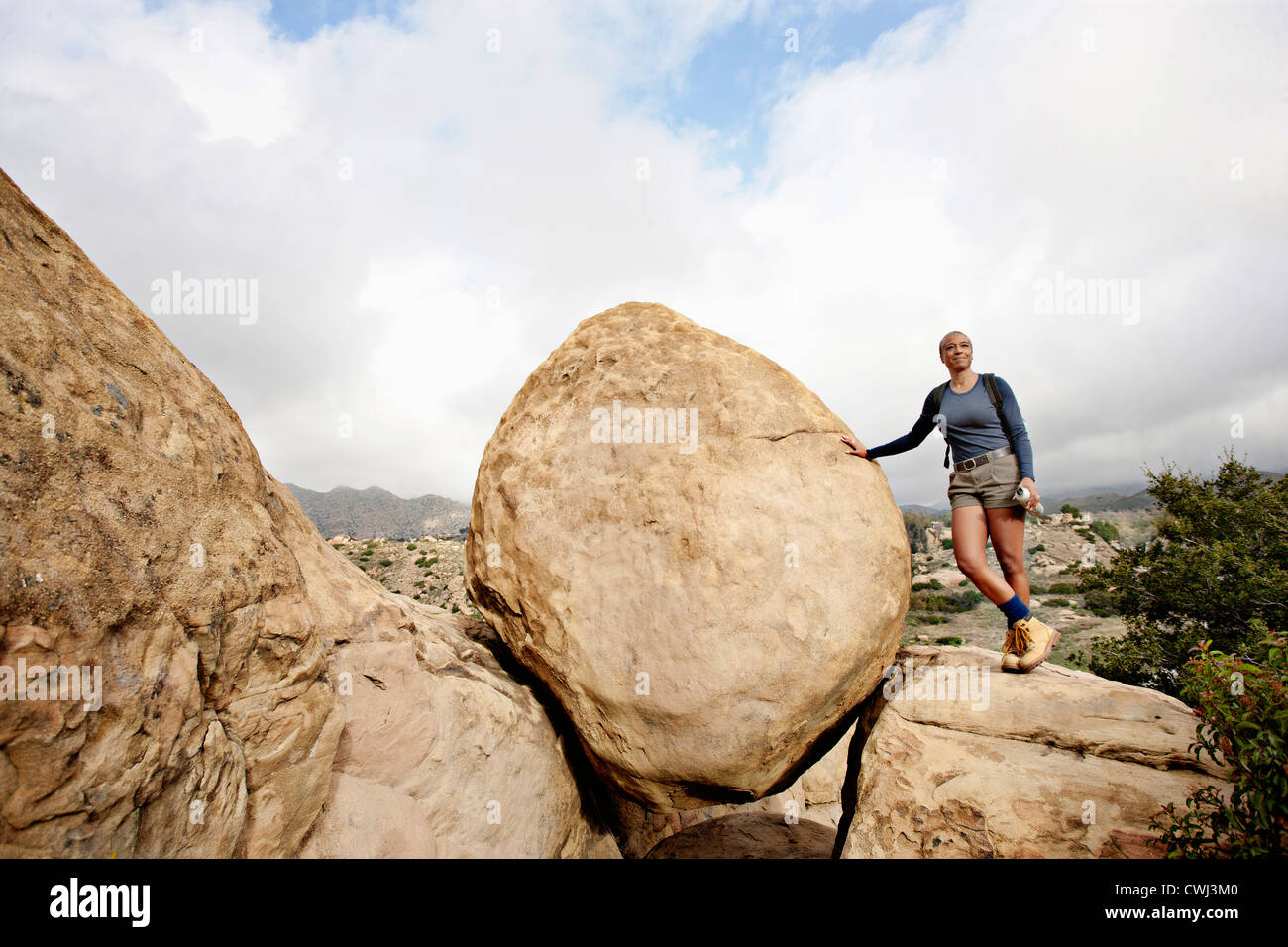 Against rock hi-res stock photography and images - Alamy