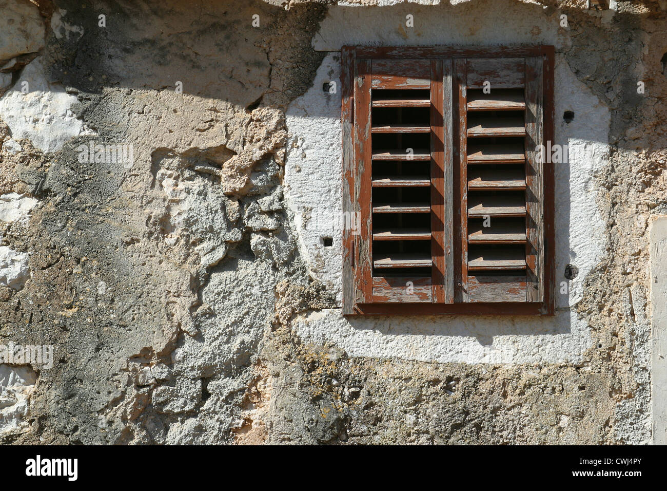 Closed window in a wall Stock Photo - Alamy