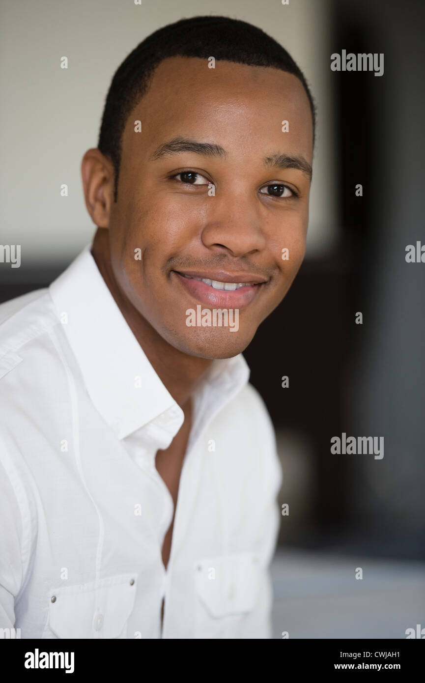 Smiling mixed race man Stock Photo - Alamy