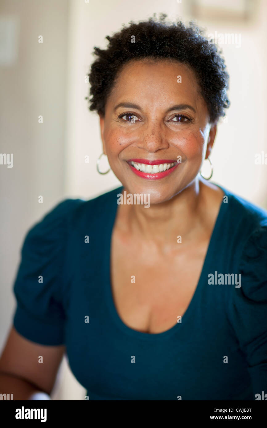 Smiling Black woman Stock Photo - Alamy