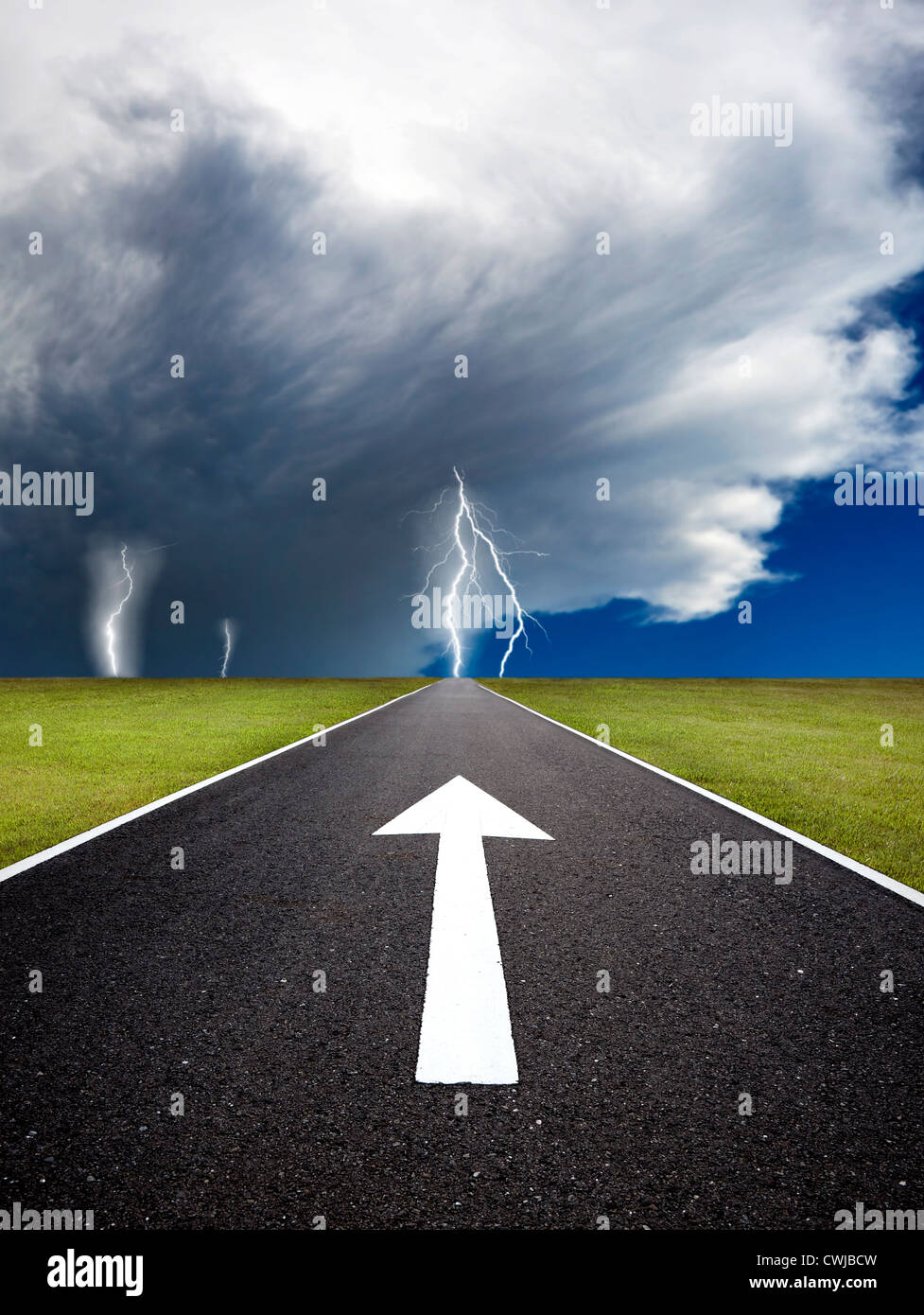 The road to the storm with thunder on the field Stock Photo - Alamy