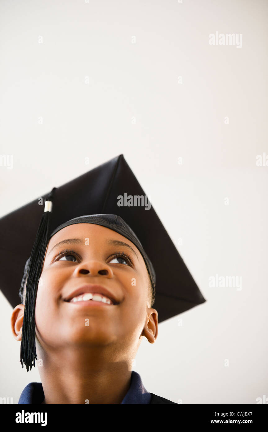 Smiling Black boy in graduation cap Stock Photo - Alamy