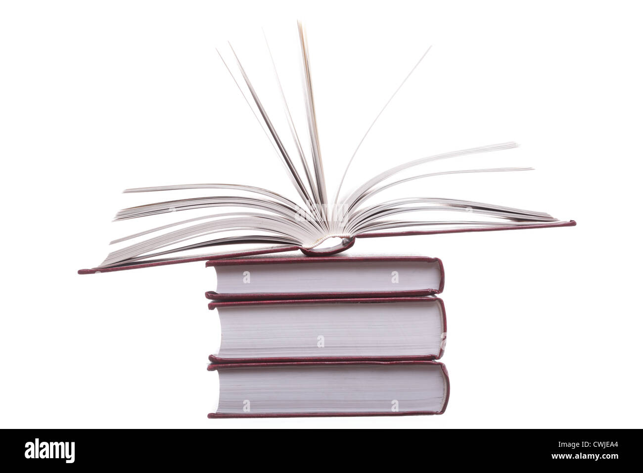 Isolated on white red book stack library object Stock Photo - Alamy