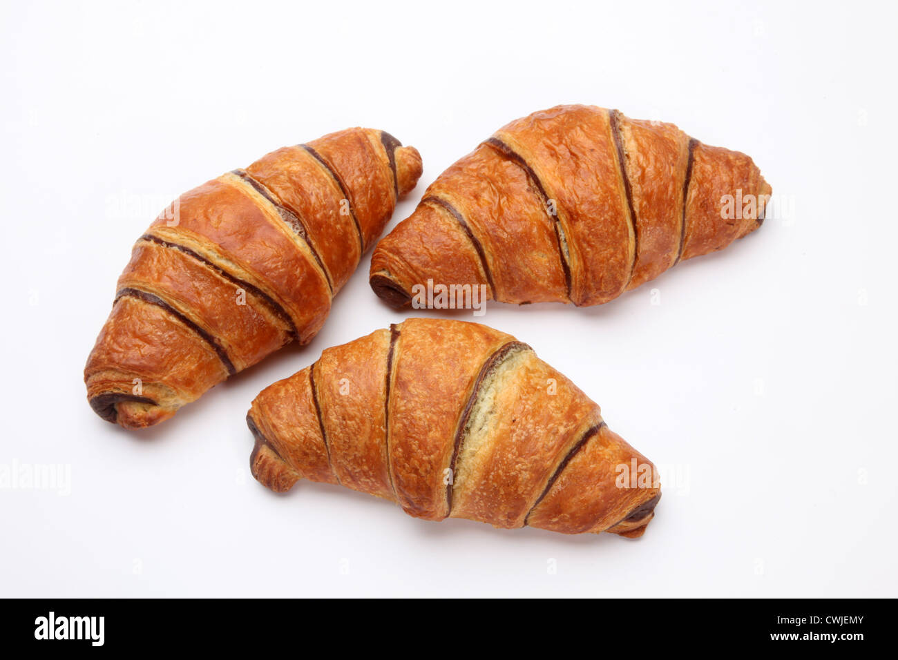 Chocolate croissant isolated on a white background Stock Photo - Alamy