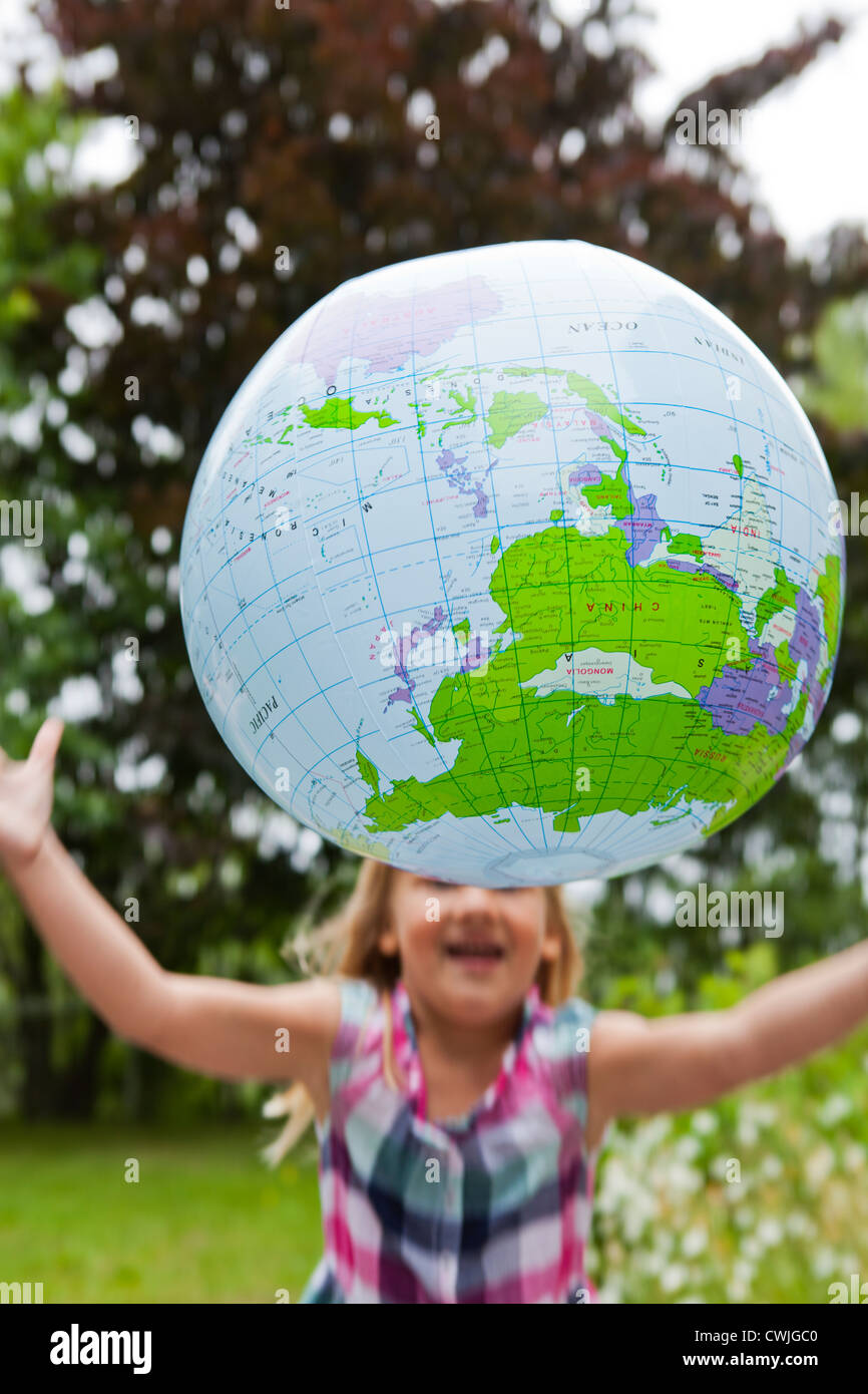 Girl Throwing Ball In The Air High Resolution Stock Photography and ...