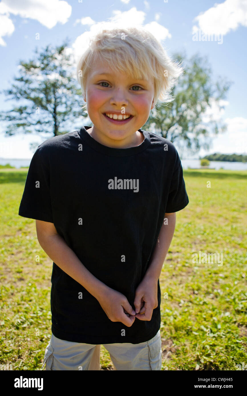 Portrait of a boy outdoors on a beautiful summer day Stock Photo - Alamy
