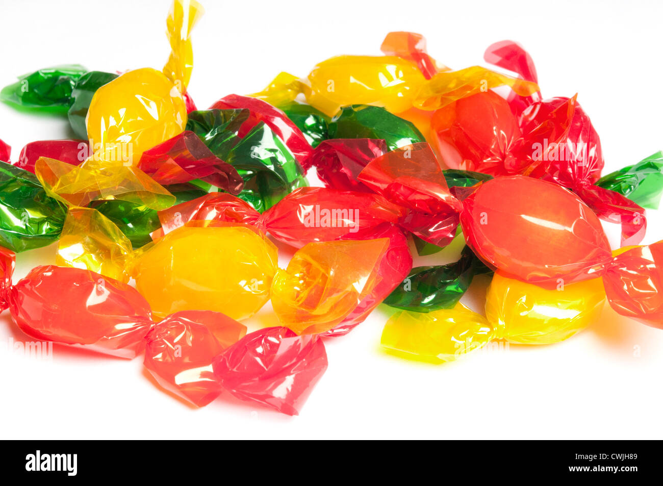 sweet candies wrapped in colorful paper Stock Photo - Alamy