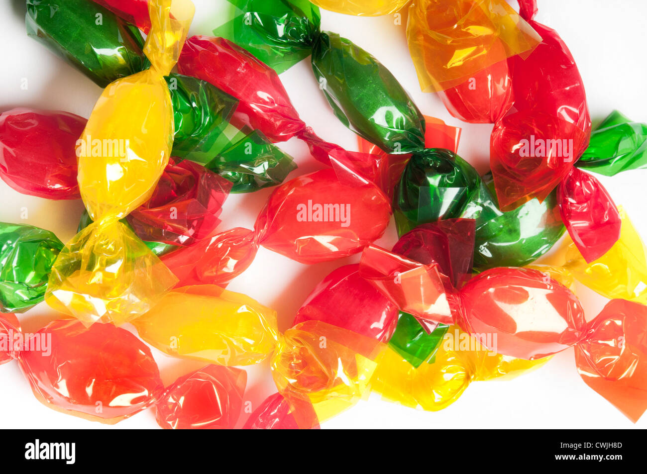 sweet candies wrapped in colorful paper Stock Photo - Alamy