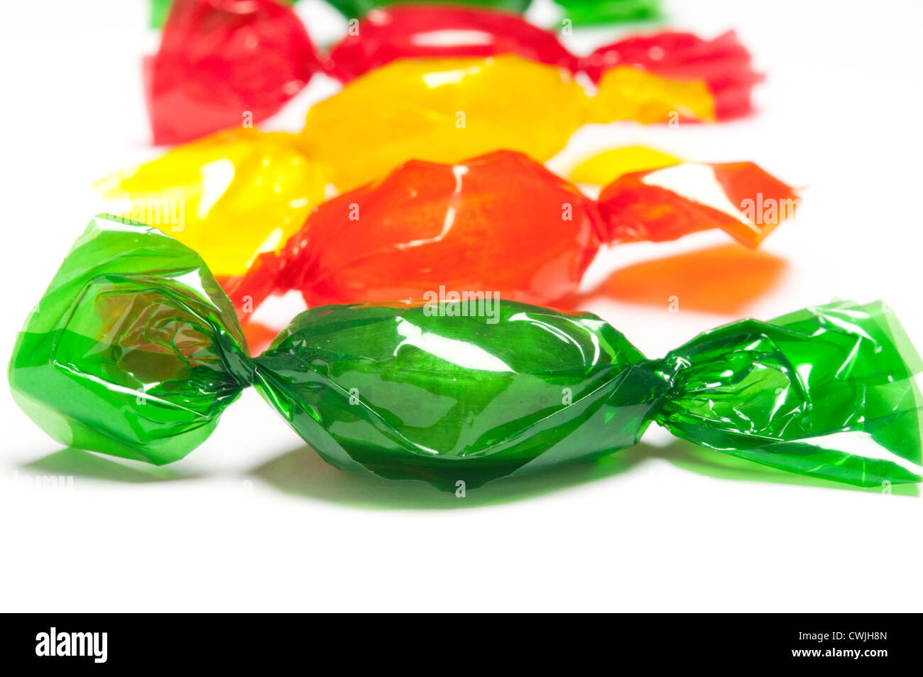 sweet candies wrapped in colorful paper Stock Photo - Alamy
