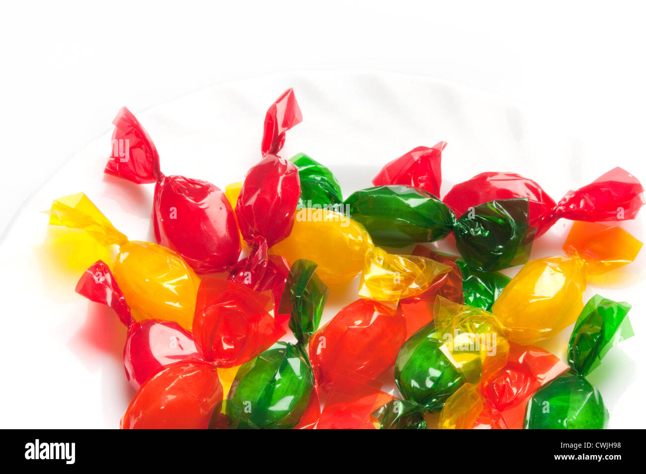 sweet candies wrapped in colorful paper Stock Photo - Alamy