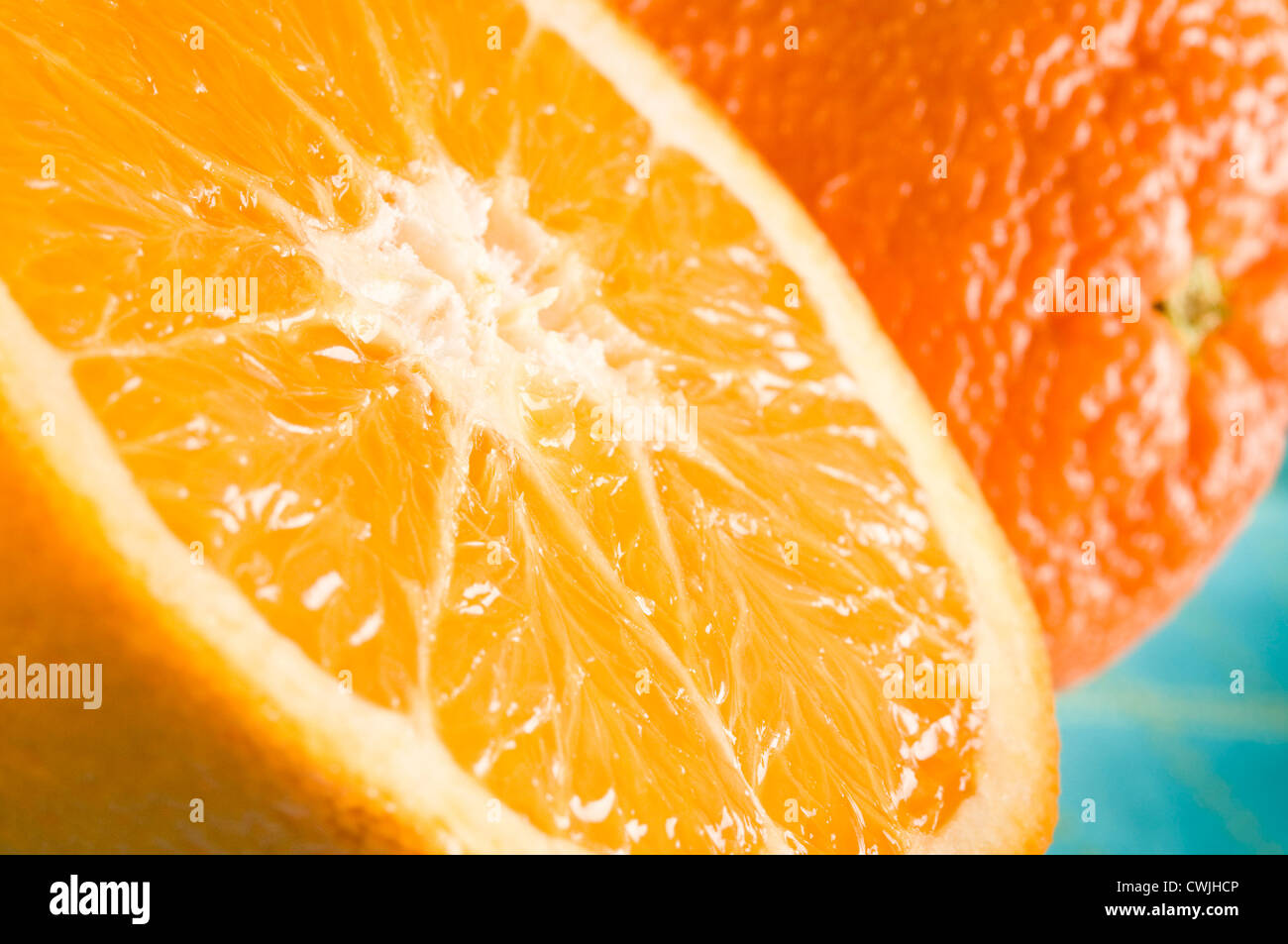orange fruits one cut in half Stock Photo - Alamy